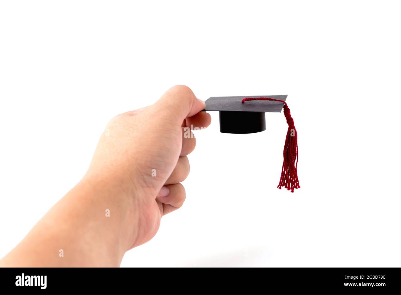 Hand pick up Graduation cap Stock Photo - Alamy