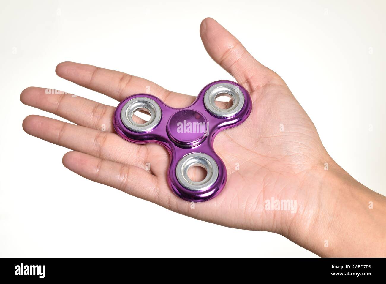 Rotating fidget spinner hi-res stock photography and images - Alamy