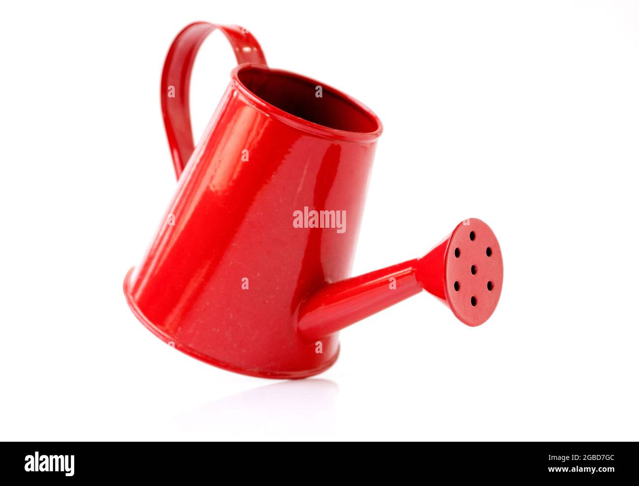 Red Metal Watering Can Stock Photo - Alamy