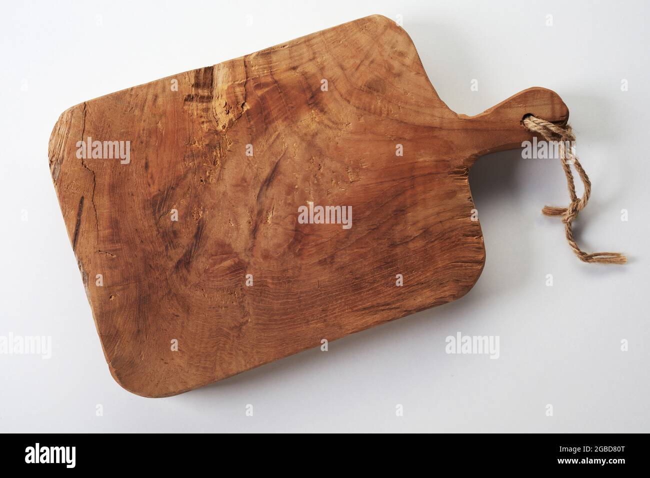 Top view of used shabby rustic style wooden chopping board with cracks ...