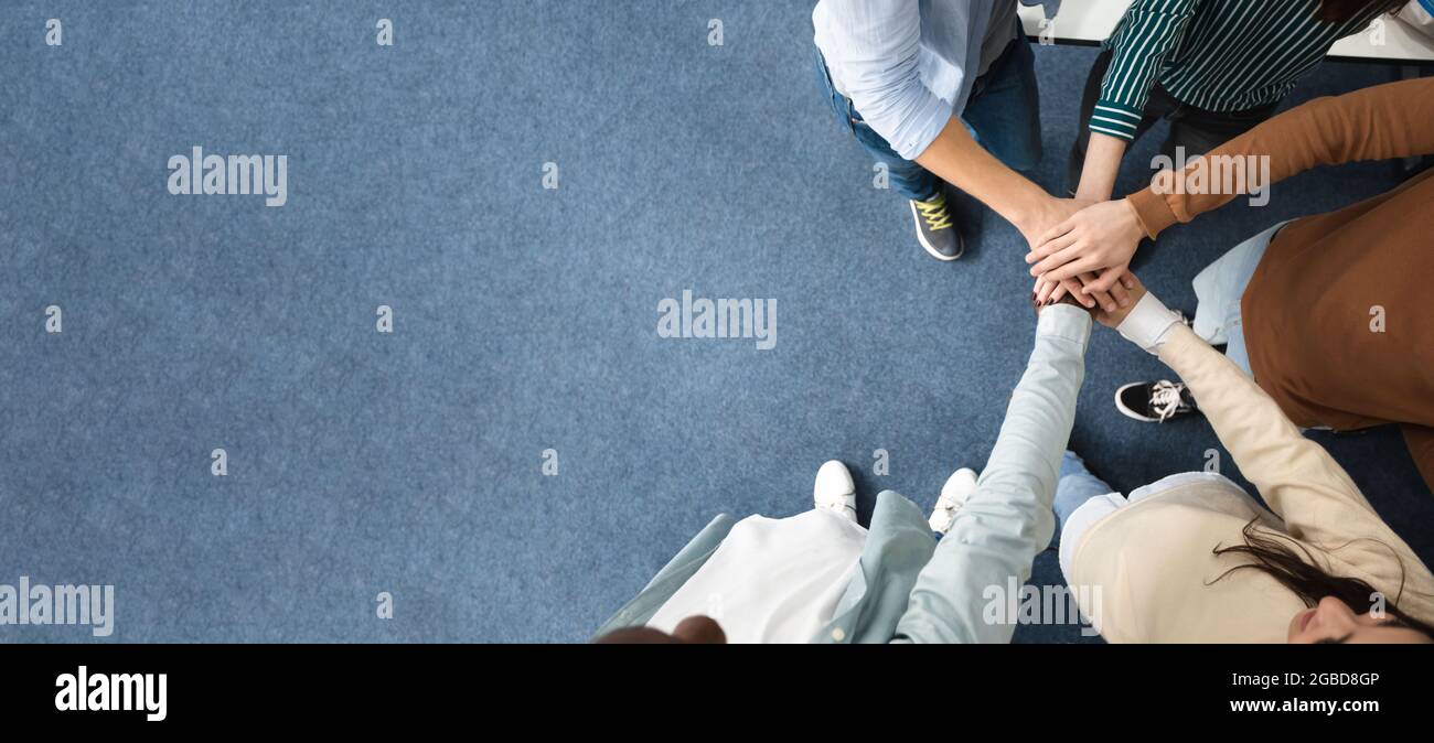 African people putting hands together hi-res stock photography and ...