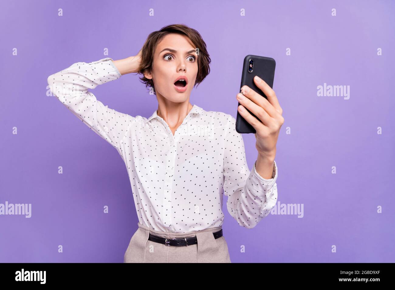 Portrait of impressed person arm on head open mouth staring phone ...