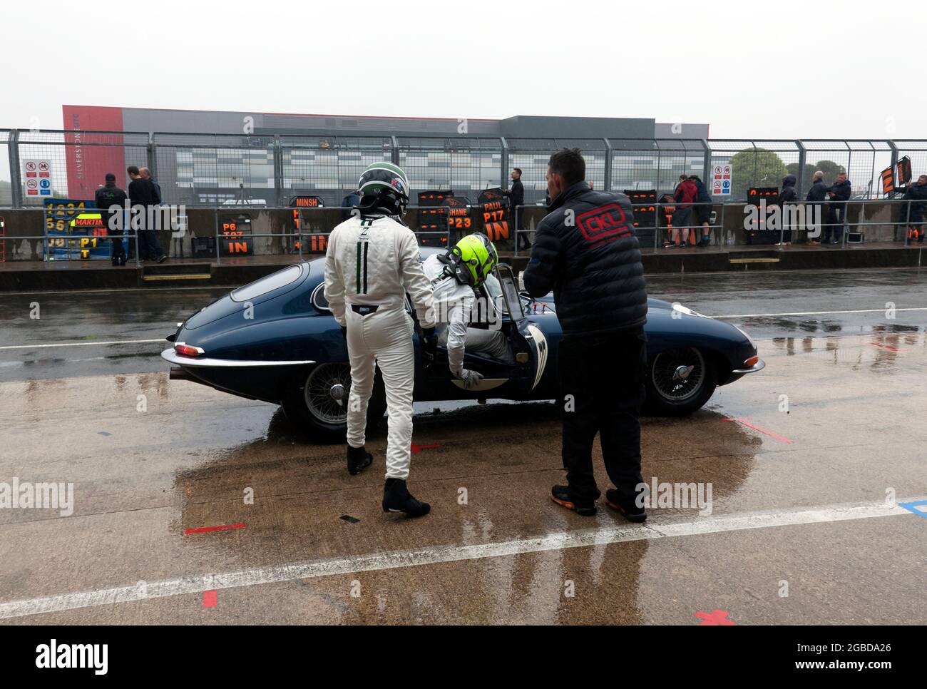 Guy Ziser and Oli Webb take a mandatory mid-race pit-stop to allow ...