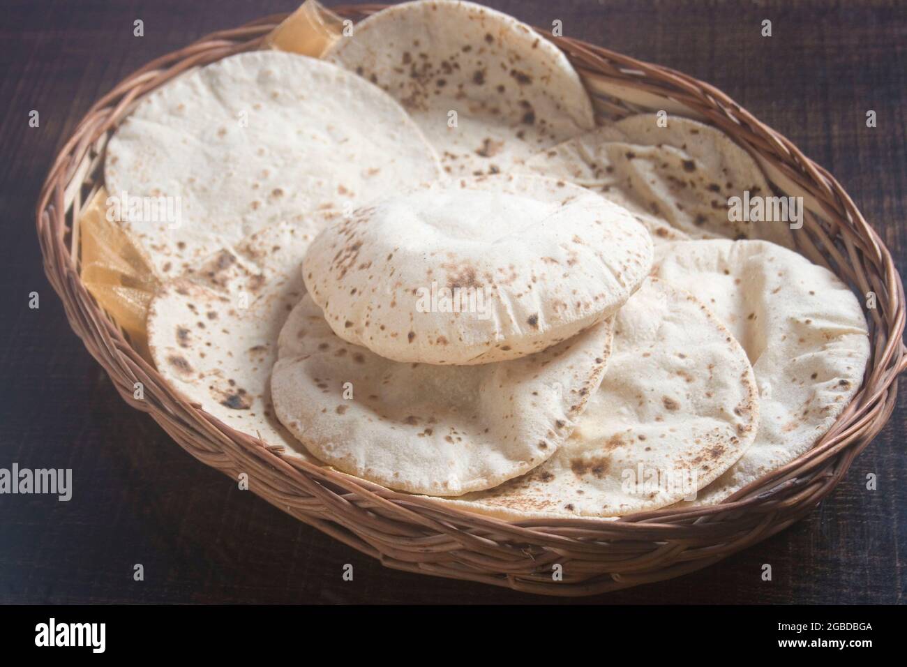 Indian bread roti.Homemade Roti Chapati Flatbread on a rustic wooden ...