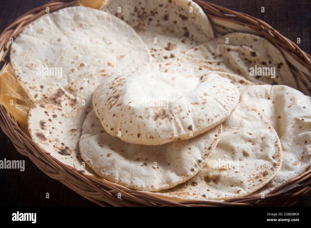 Indian bread roti.Homemade Roti Chapati Flatbread on a rustic wooden ...