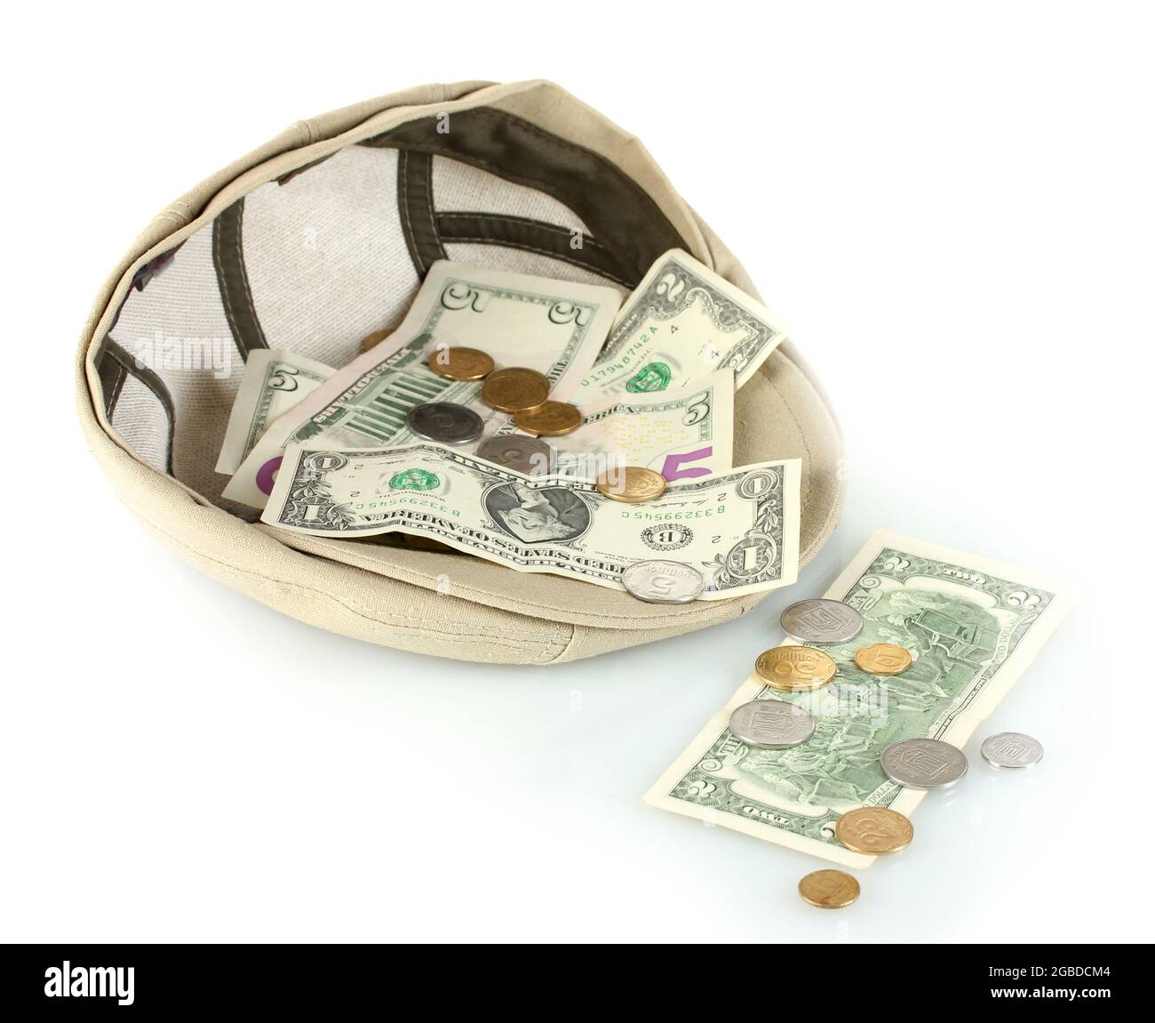 cap with money on a white background Stock Photo - Alamy