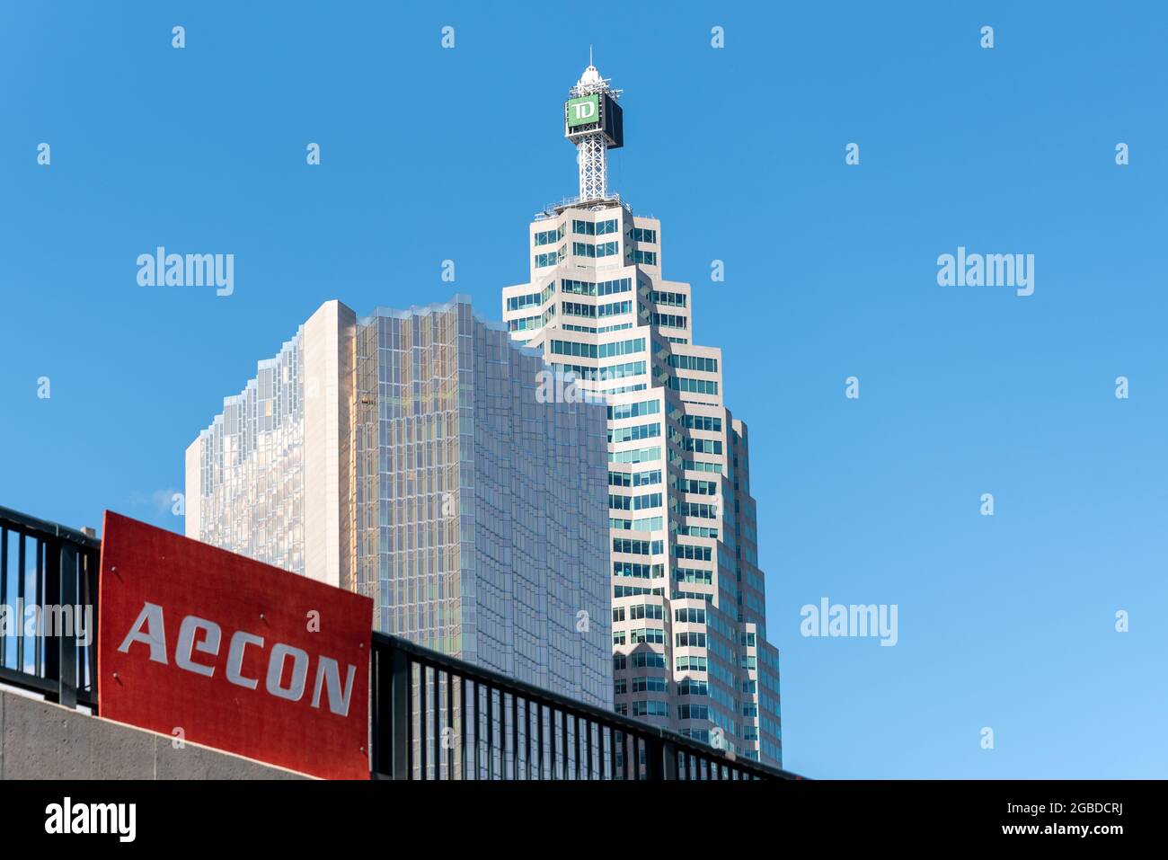 Sign of the Aecon construction company in a bridge. Close-up of ...