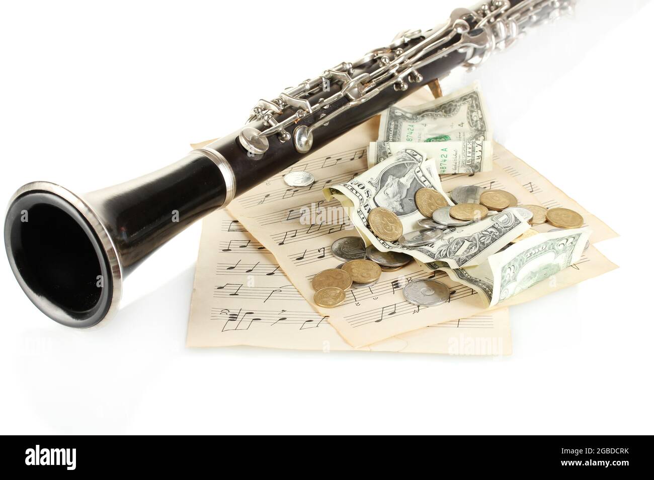 musical instrument with money isolated on white Stock Photo - Alamy