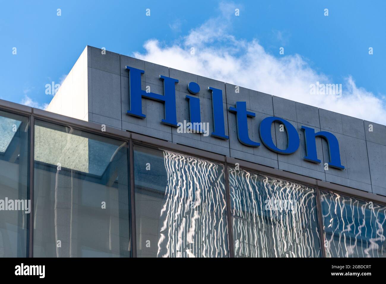 Business sign of the Hilton Hotel in the downtown district of Toronto ...
