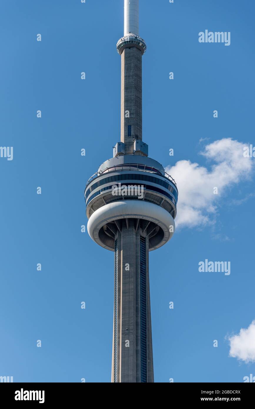 The CN Tower on a summer blue sky day. The Canadian National Tower is a ...