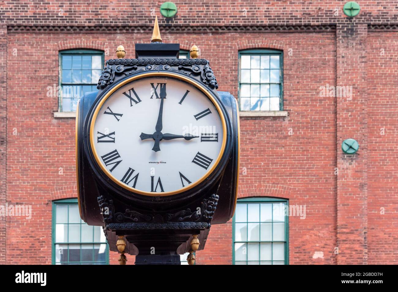 Antique clock decorating the Distillery District which is a heritage ...