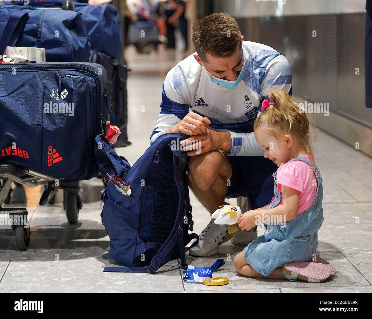 Olympic gymnast Max Whitlock with his daughter Willow as he arrives ...