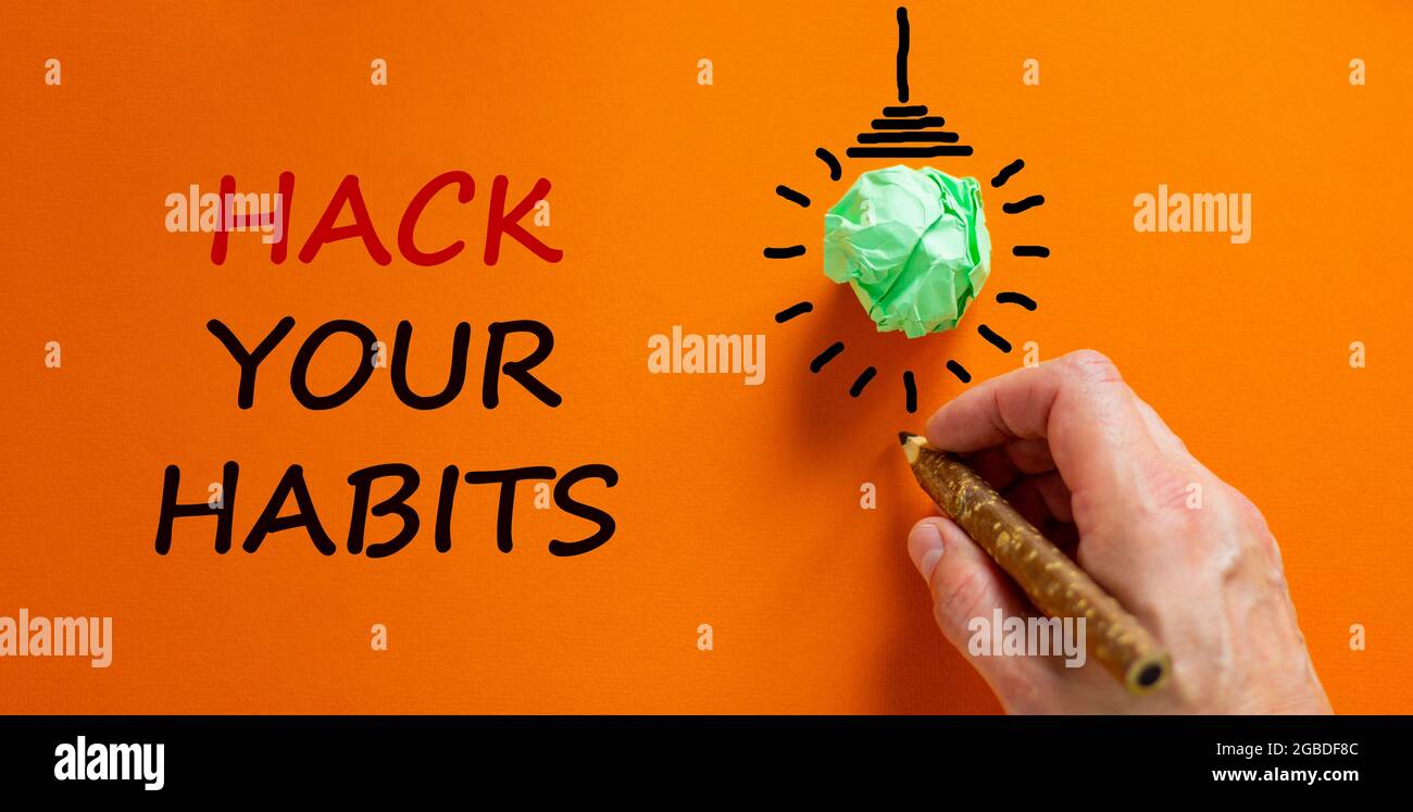 Hack your habits symbol. Businessman writing words 'Hack your habits ...