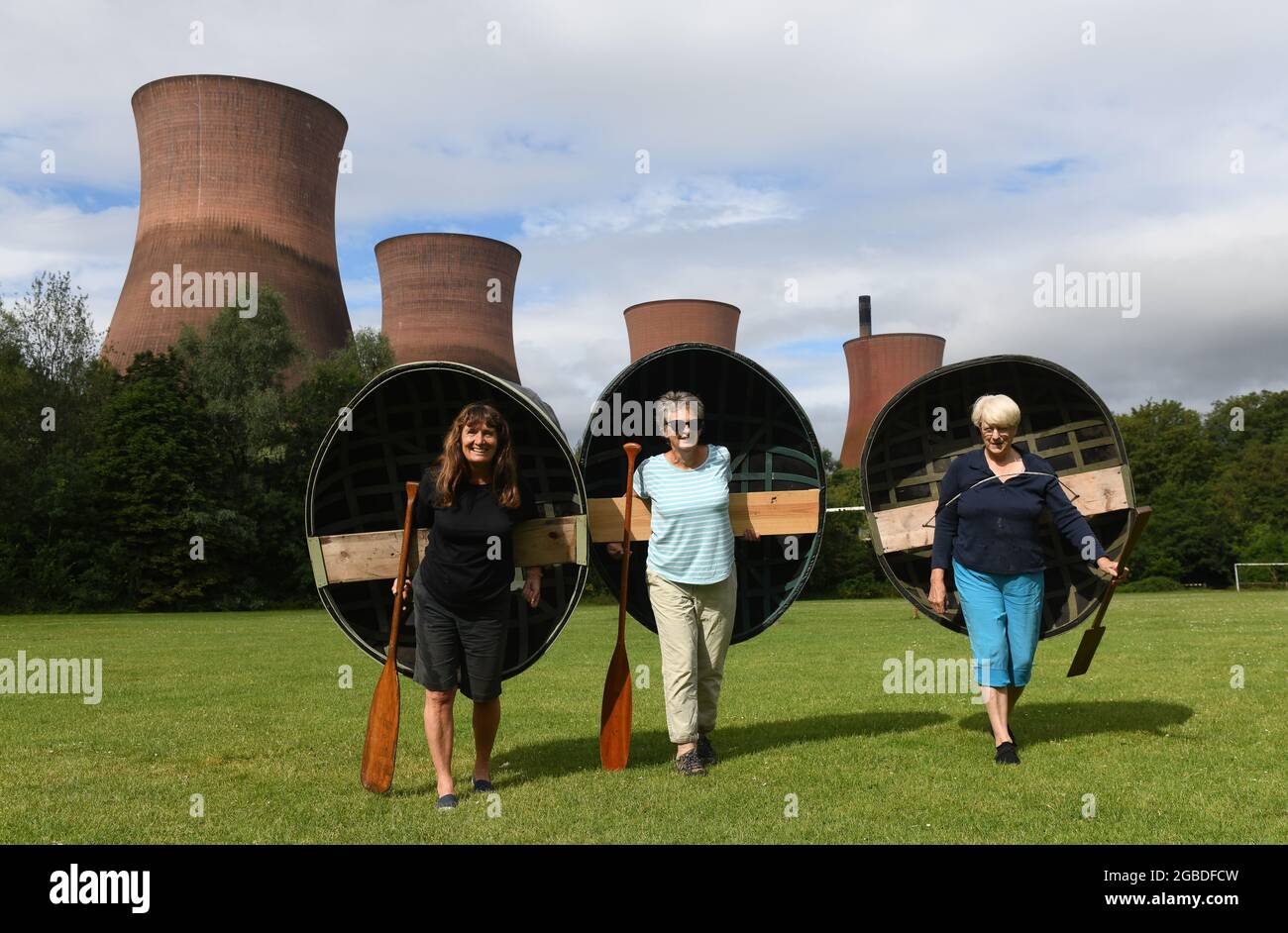 Members of the Ironbridge Coracle Society carrying their coracles from ...
