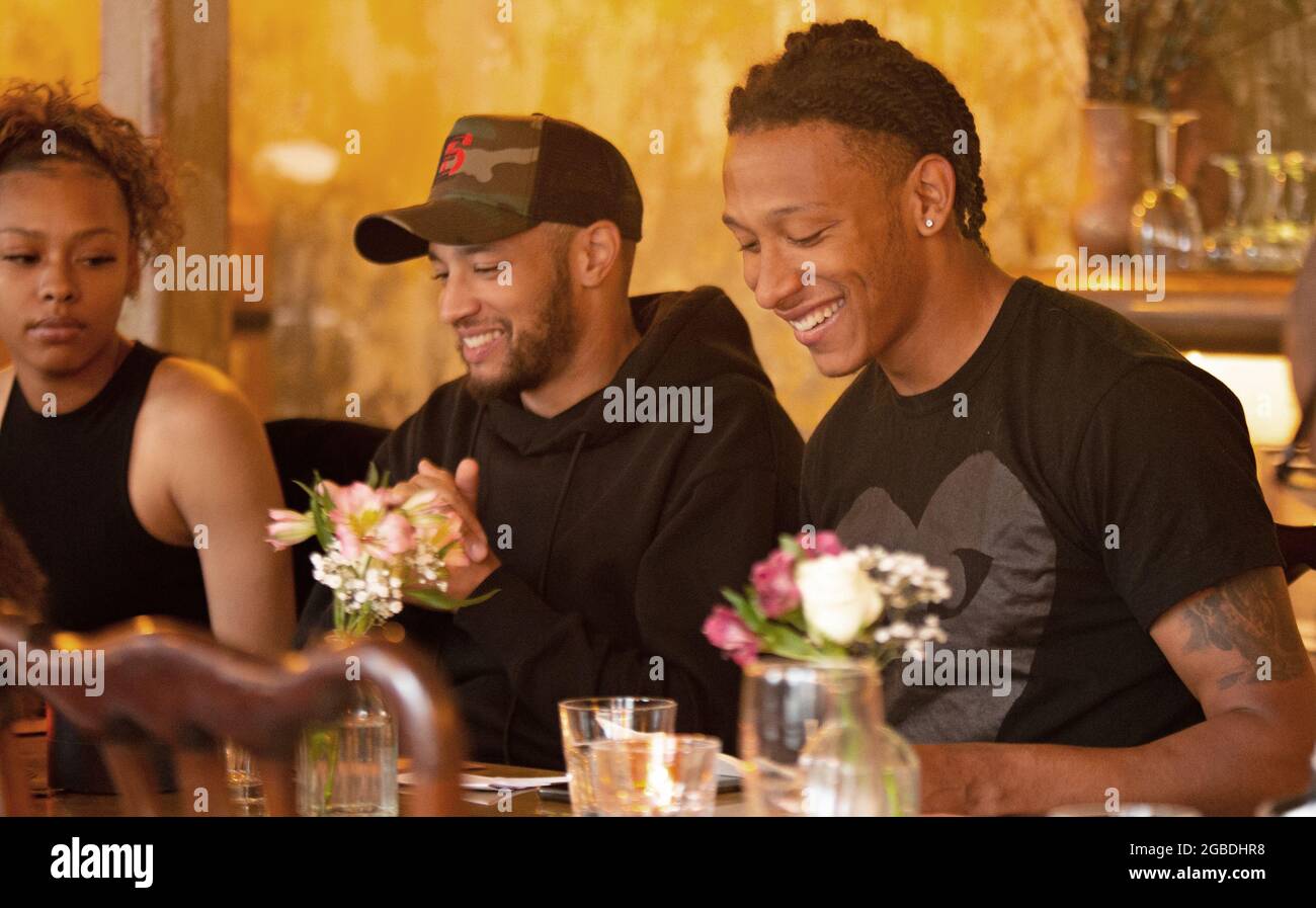 Silver medallist BMXer Kye White (r) at a welcome home party at the ...