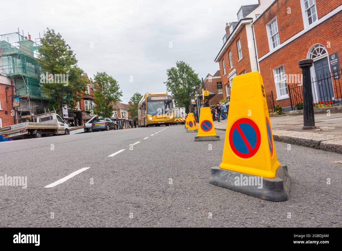 Roadworks on Broad Street in Wokingham, UK with cones lining the side ...