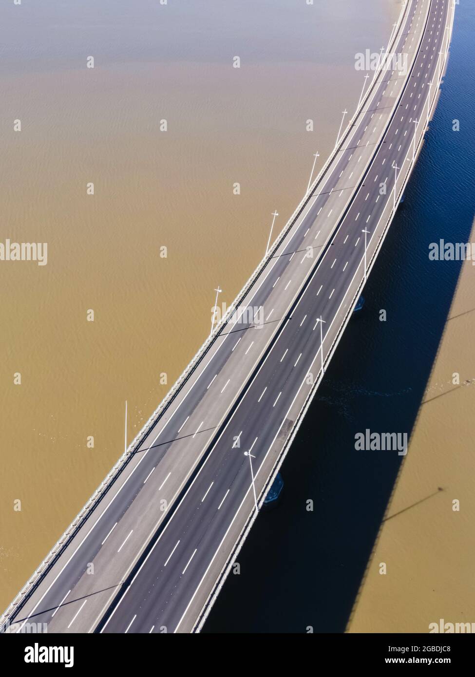 Aerial shot of beautiful Vasco da Gama bridge, a suspended highway road ...