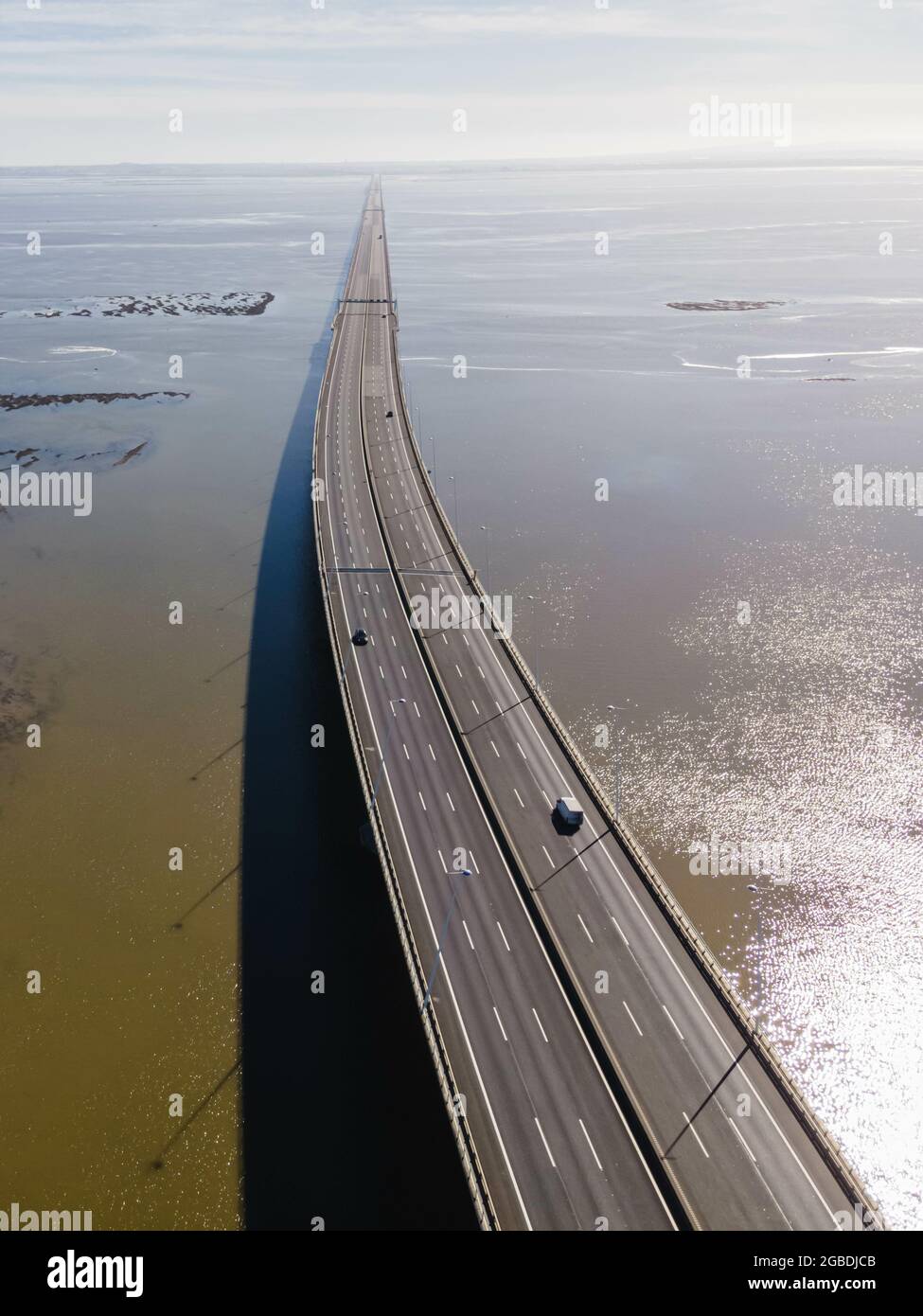 Aerial shot of beautiful Vasco da Gama bridge, a suspended highway road ...