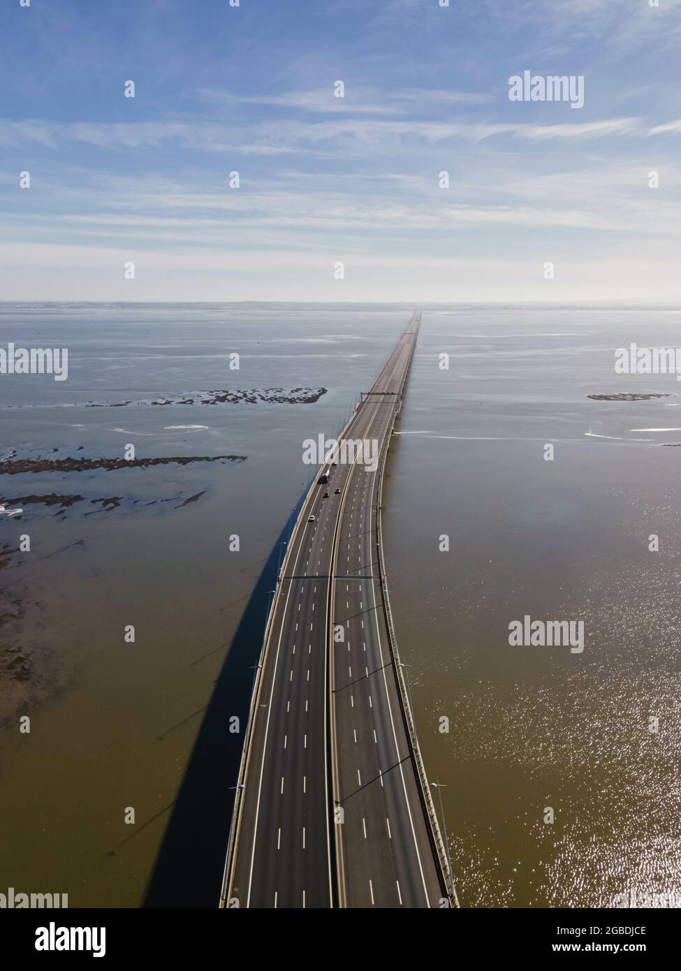 Aerial shot of beautiful Vasco da Gama bridge, a suspended highway road ...