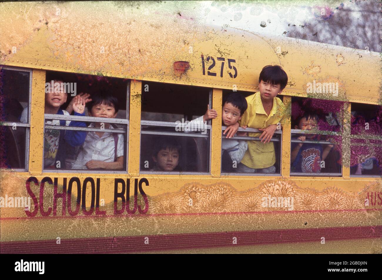Elementary school kids on public school bus, ©1990 Stock Photo - Alamy