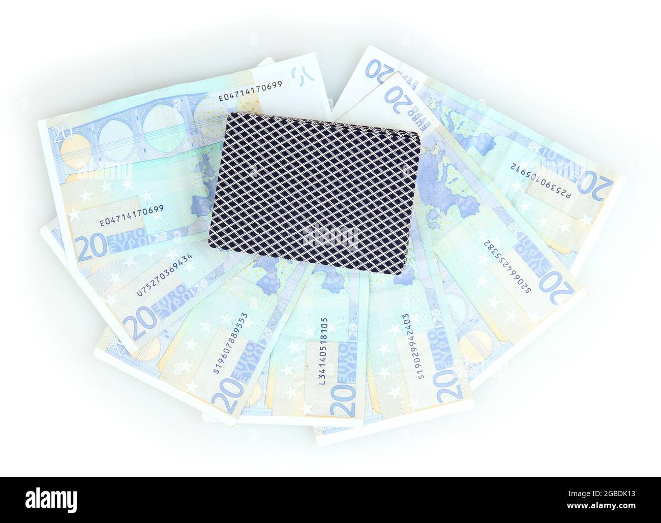 Euro and a deck of playing cards isolated on white Stock Photo - Alamy