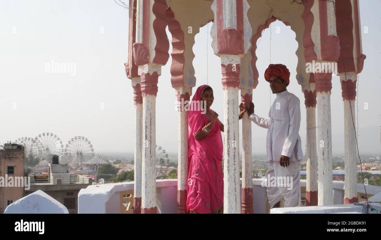 Indian couple in traditional clothes talking to each other Stock Photo ...