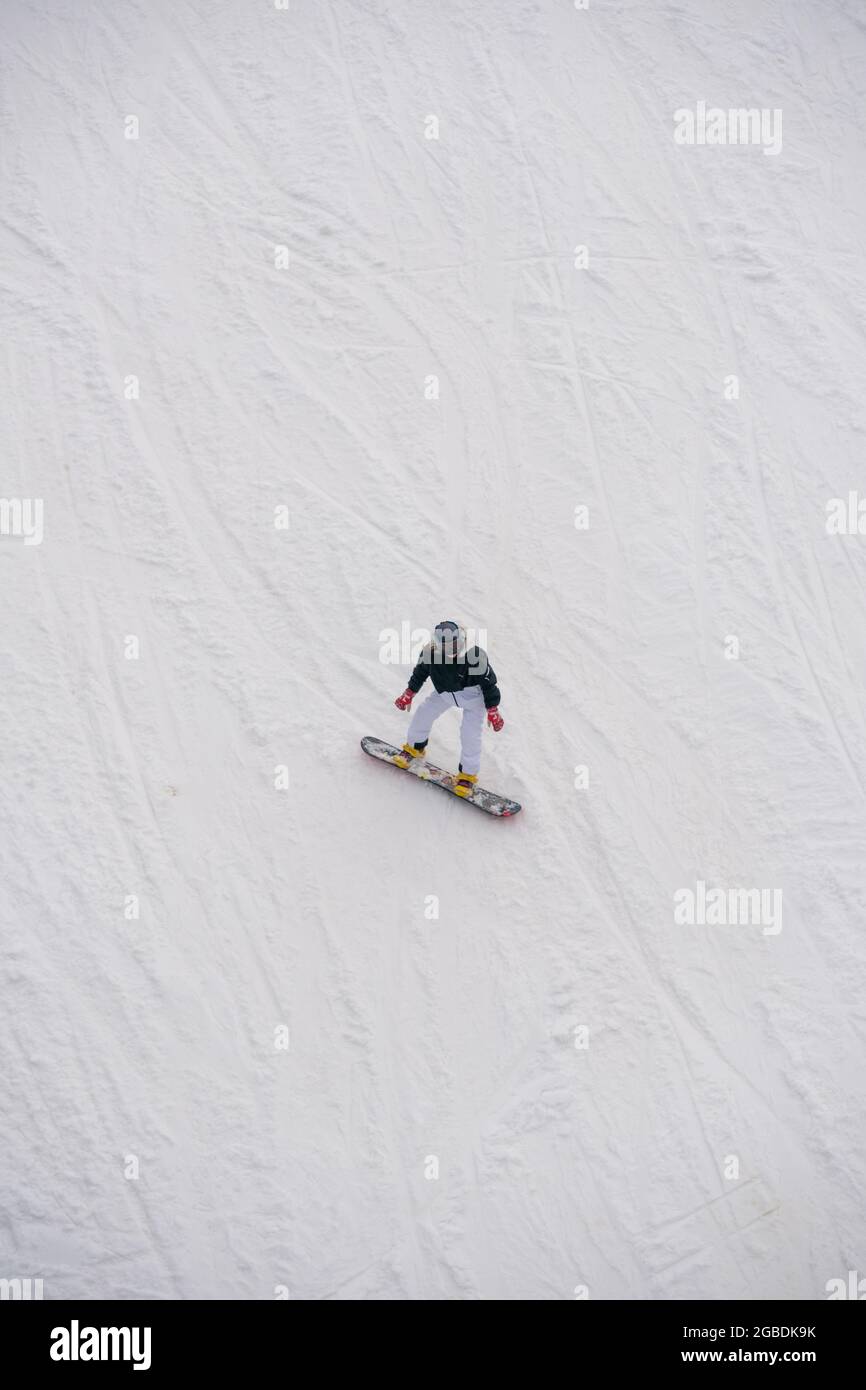 Skier riding track mountain slope hi-res stock photography and images ...