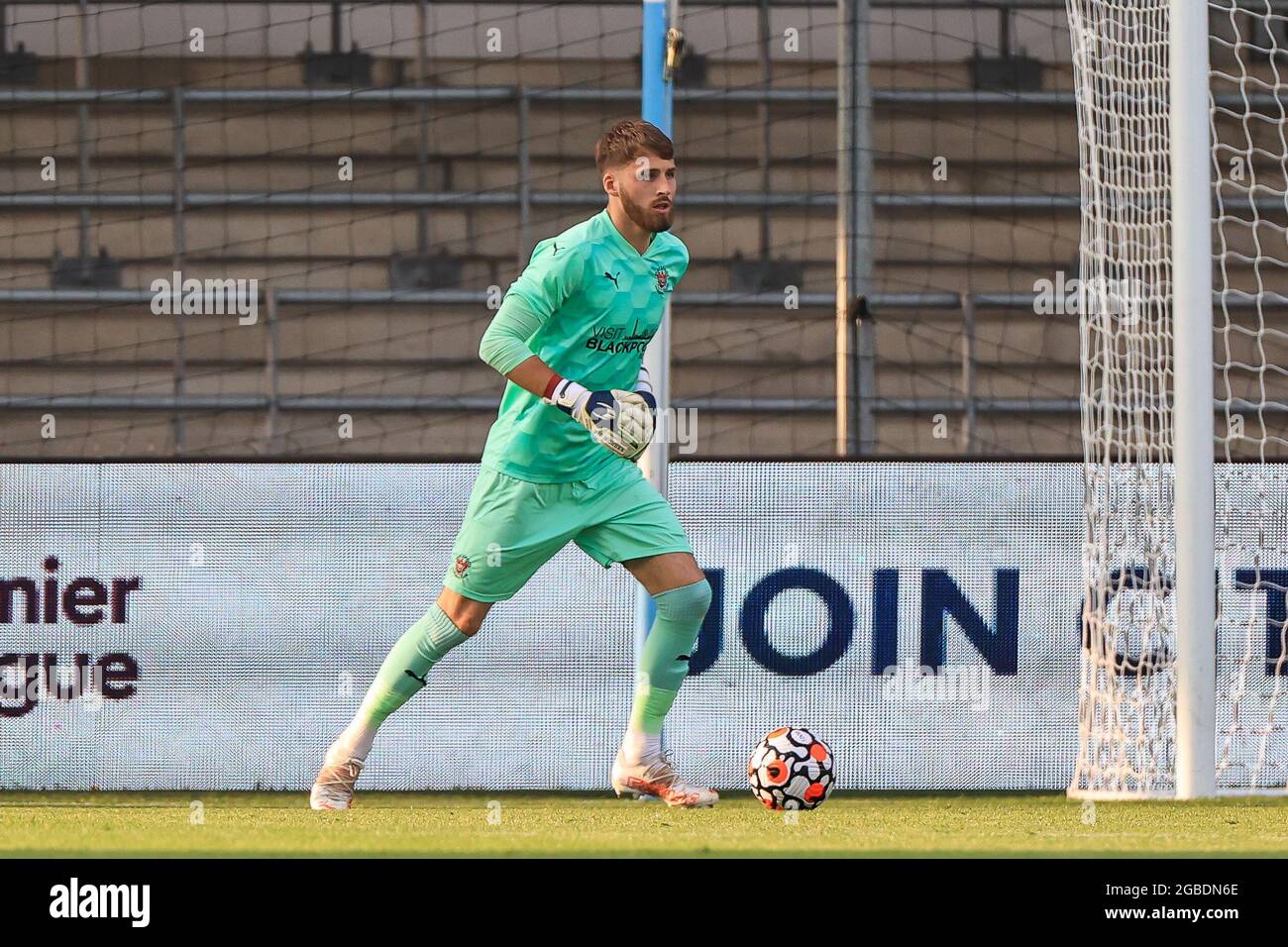Daniel Grimshaw of Blackpool with the ball Stock Photo - Alamy
