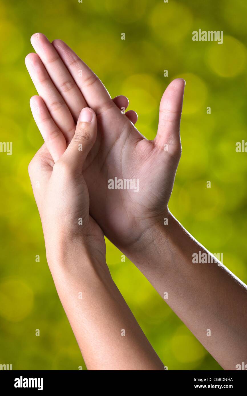 self shiatsu pressing palm for stress relief Stock Photo - Alamy