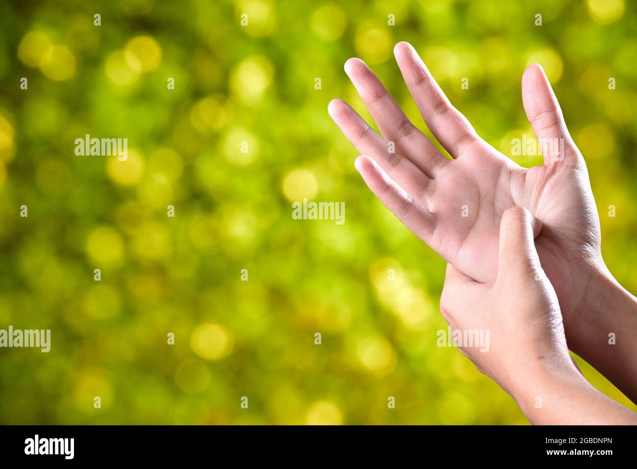 Pressing Palm for Stress Relief, Self Doing Acupressure Stock Photo - Alamy