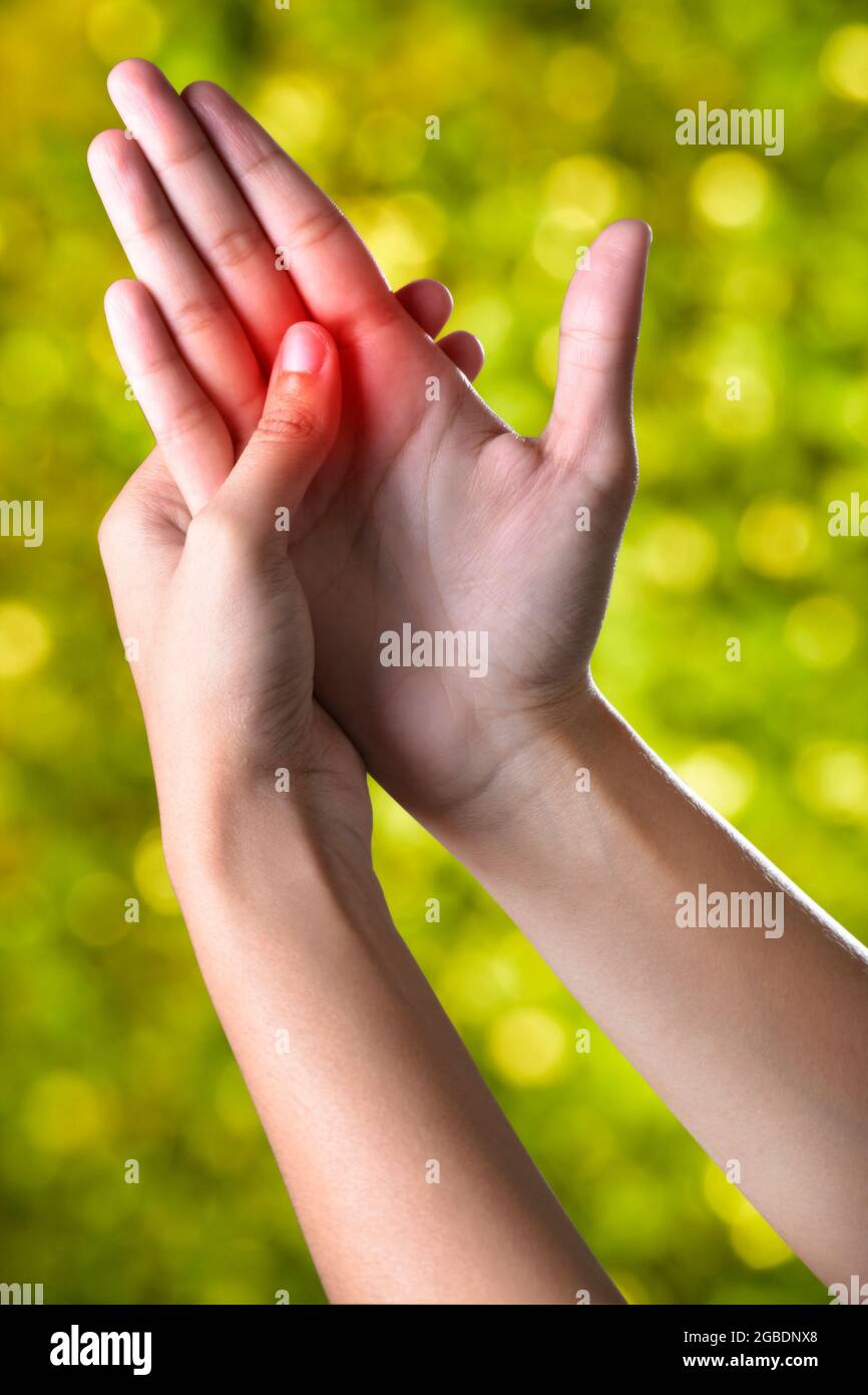 acupressure health concept, acupressure hand on green background Stock ...