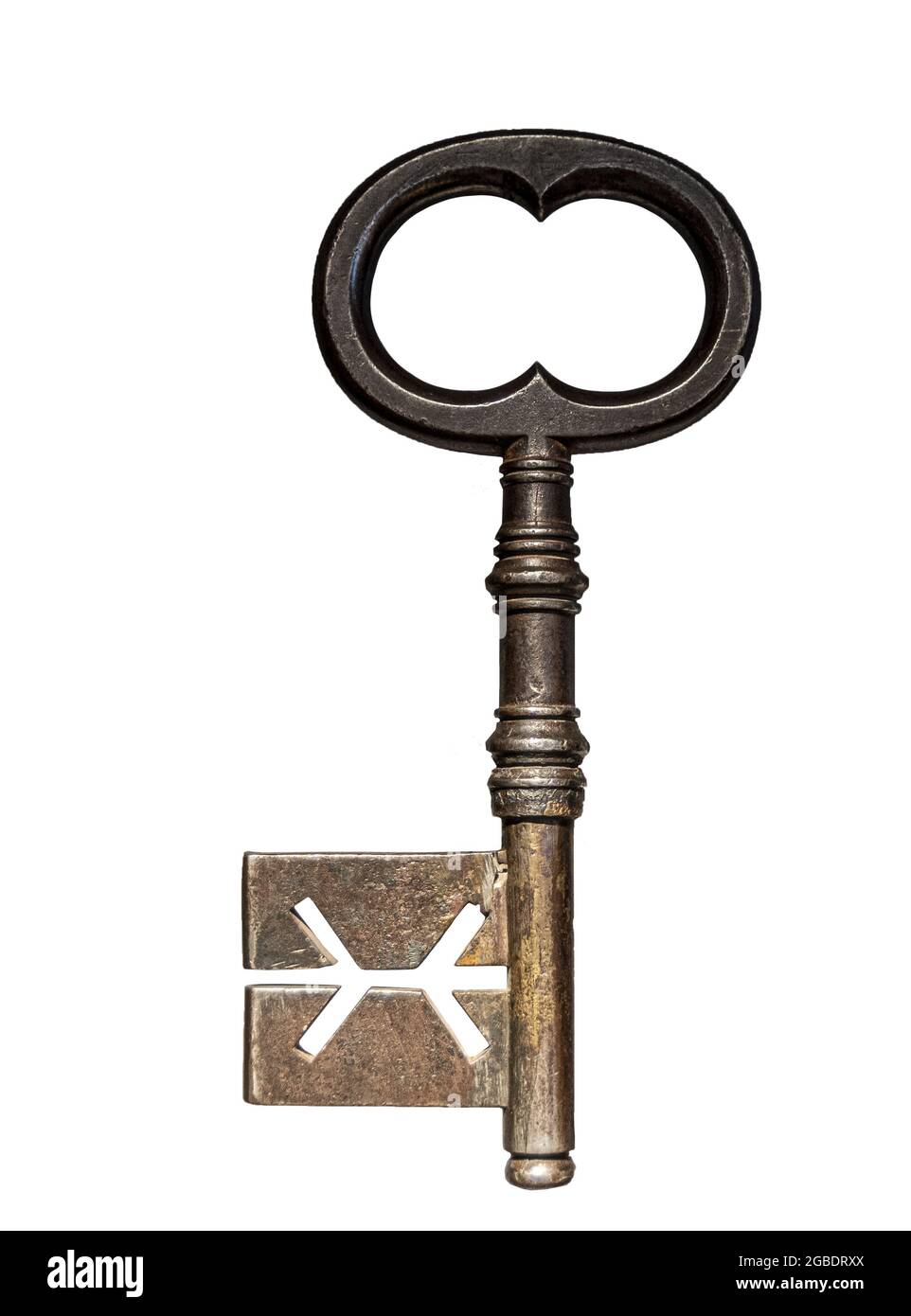 PARIS, FRANCE - Mar 24, 2020: A vertical shot of an old key on a white ...
