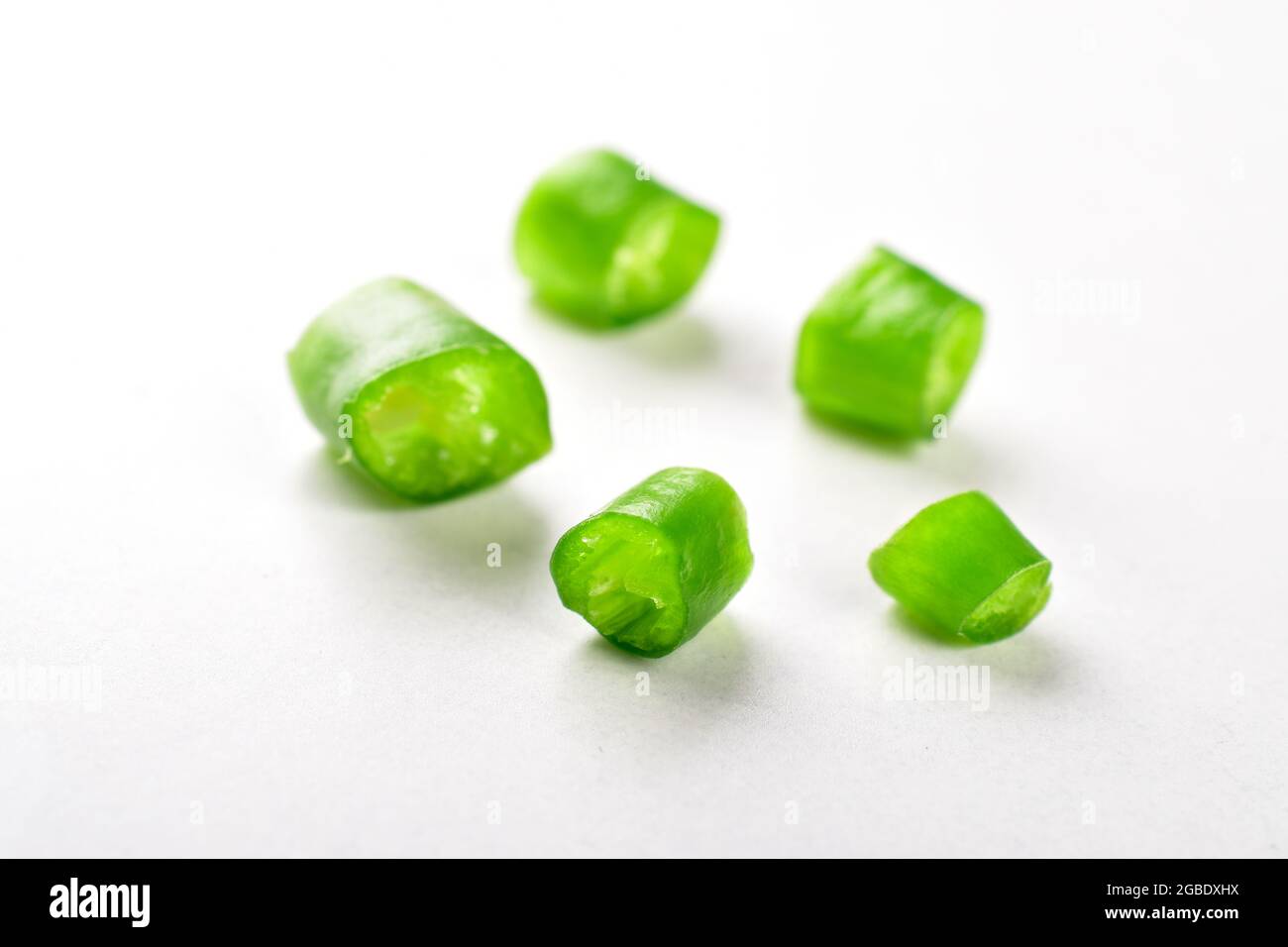 Chopped Green Chili Isolated On White Background Stock Photo - Alamy