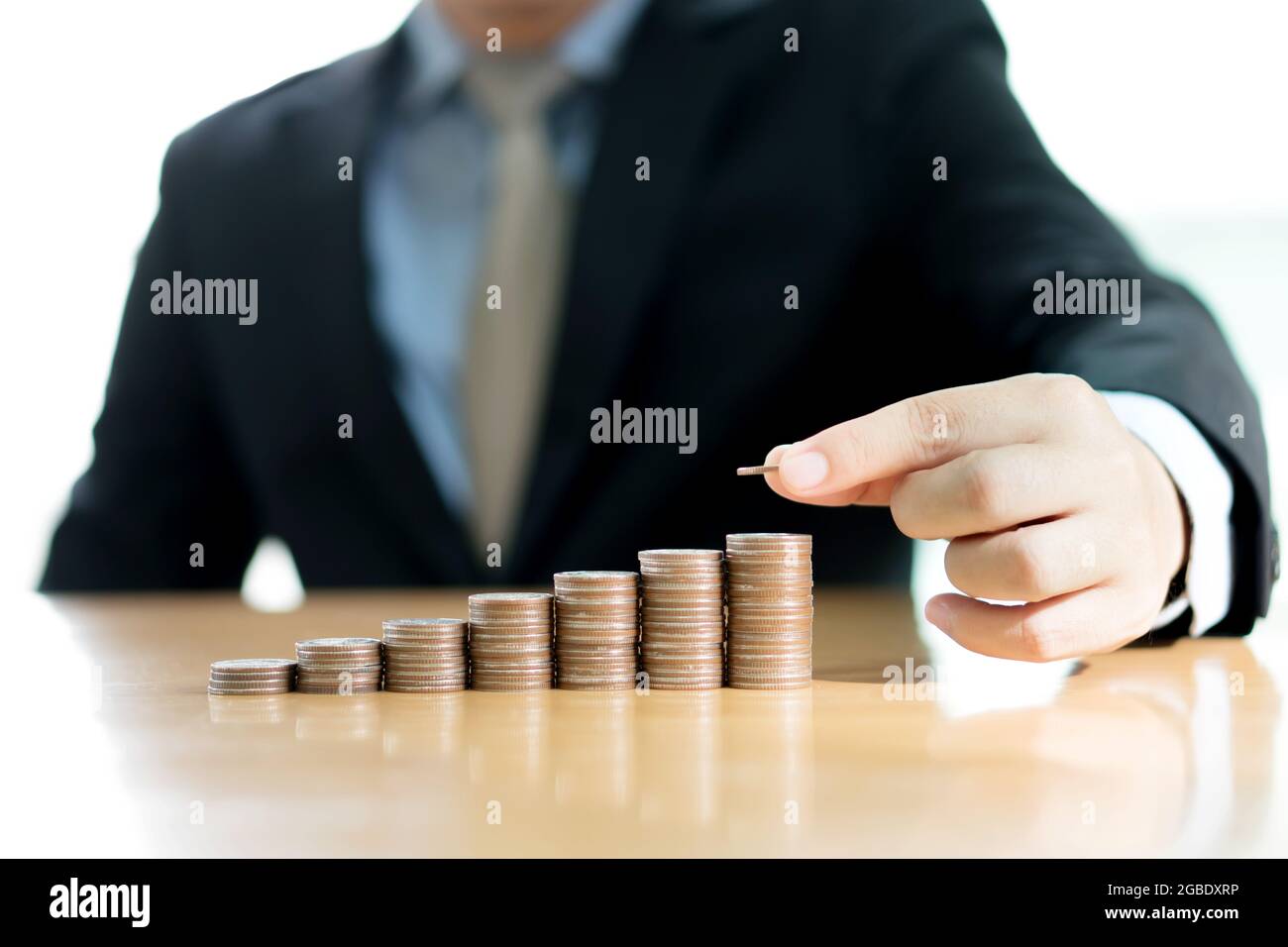 Coin stack growing hi-res stock photography and images - Alamy