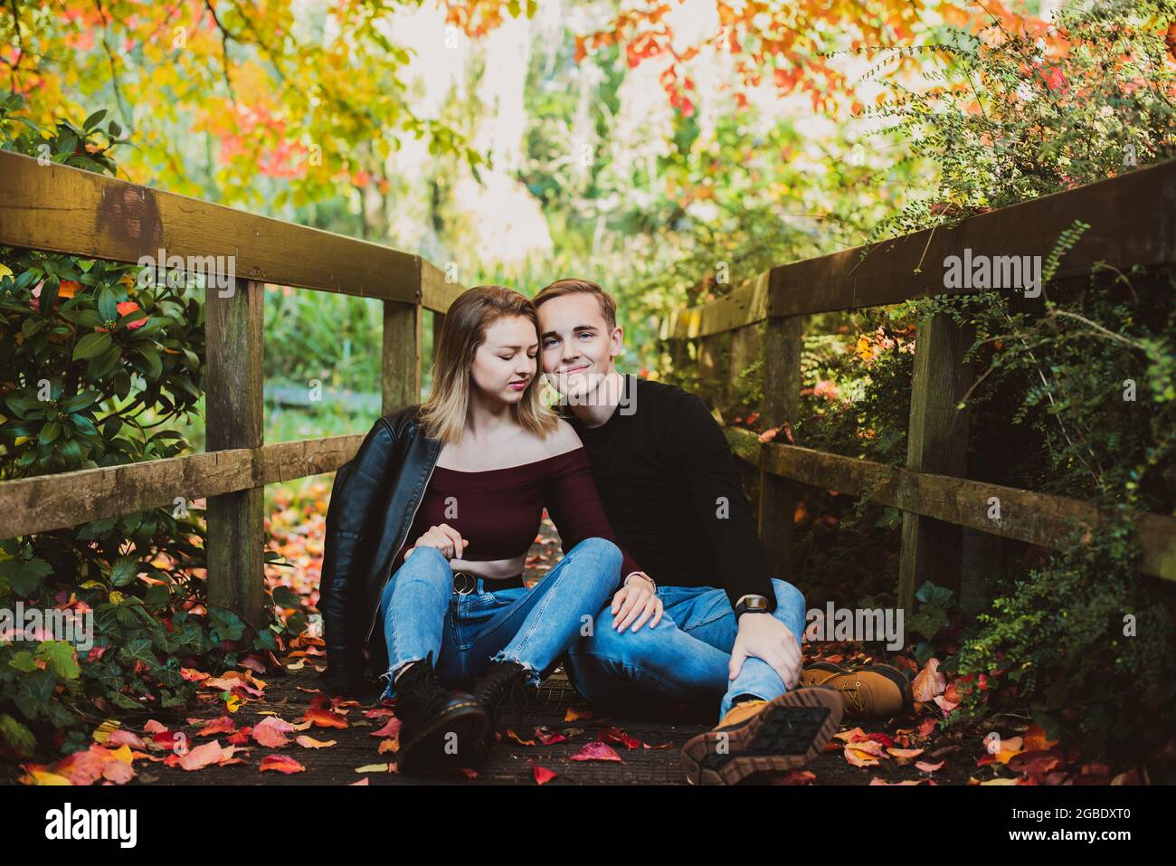 Young caucasian couple in love enjoys a moment of happiness in nature ...