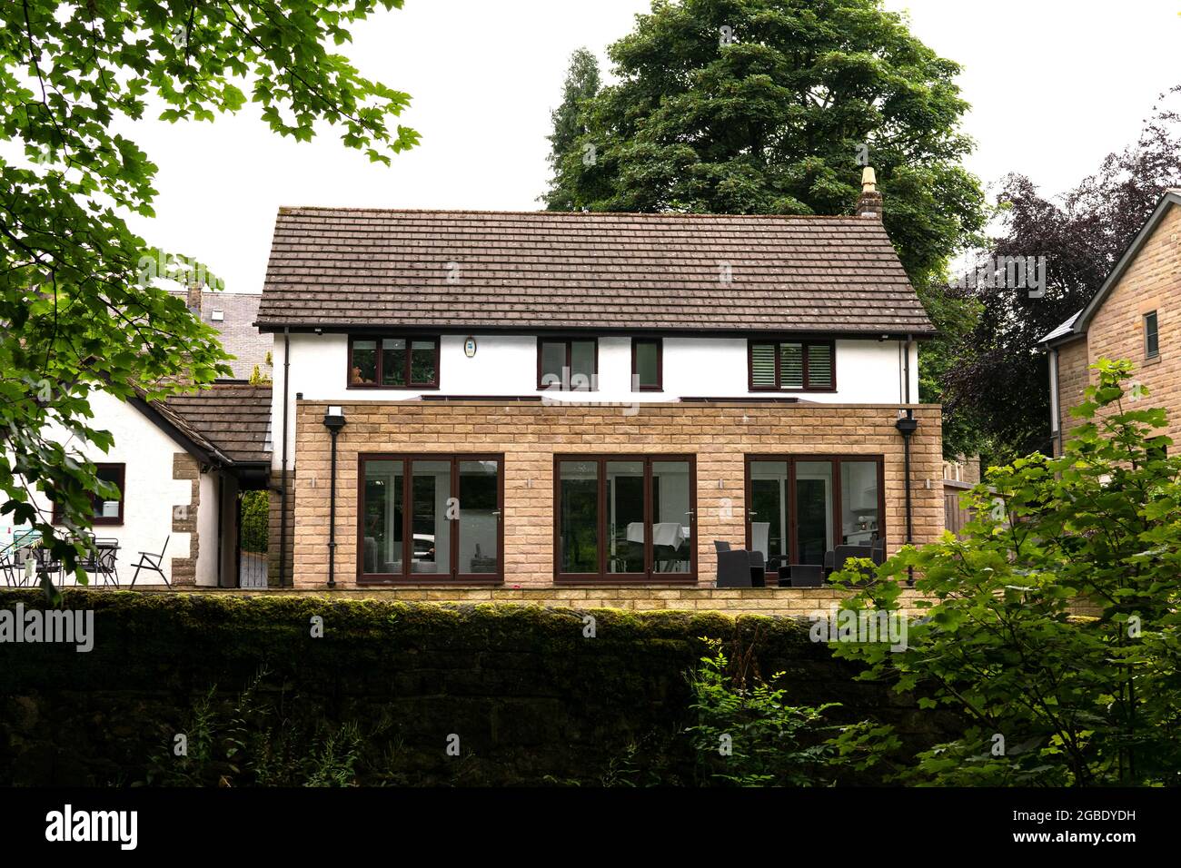 Example of a modern detached executive home Stock Photo - Alamy