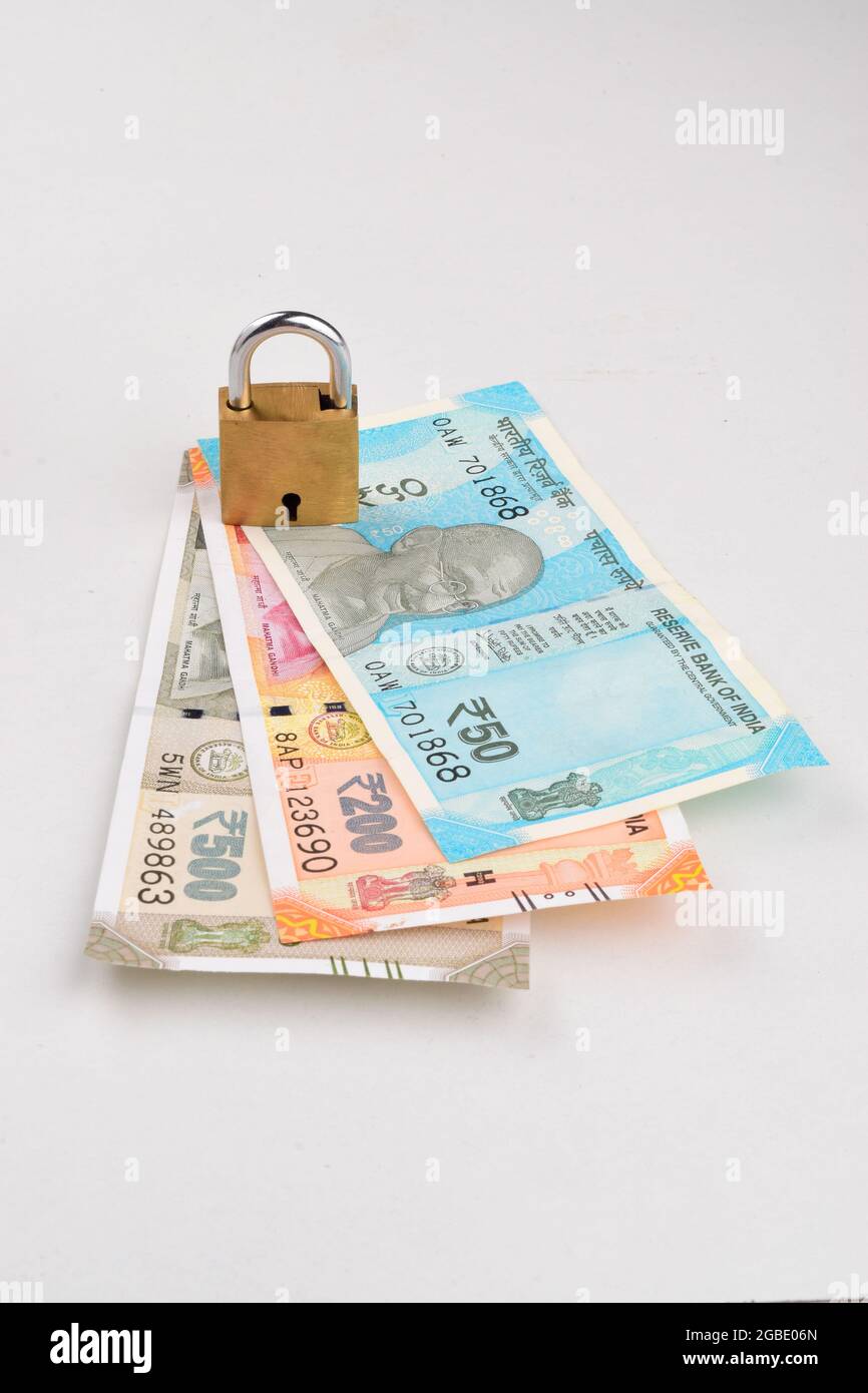 Indian Currency with Lock Isolated on White Background Stock Photo - Alamy