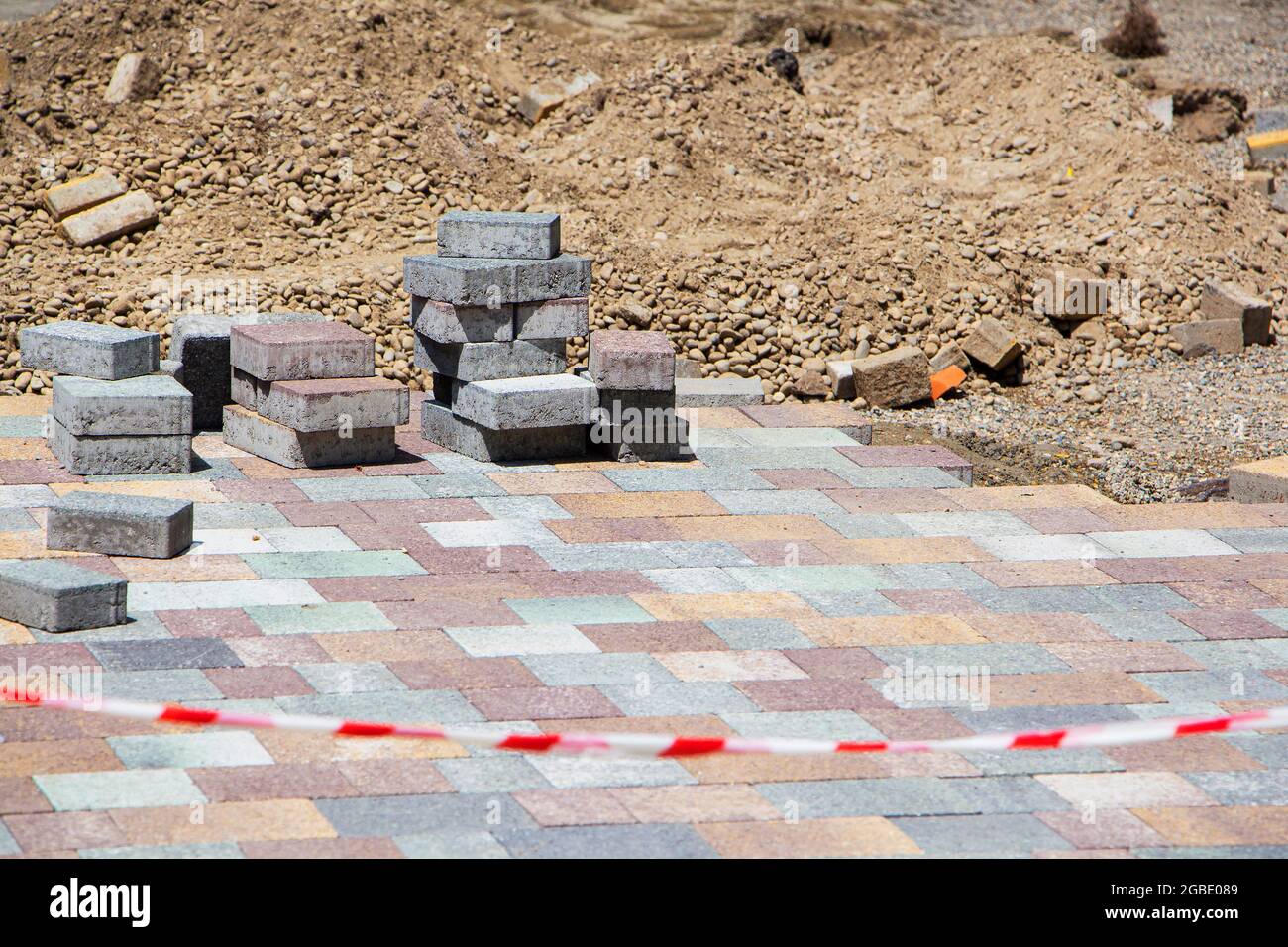 Process of construction of brick paved sidewalk, half built pavement ...