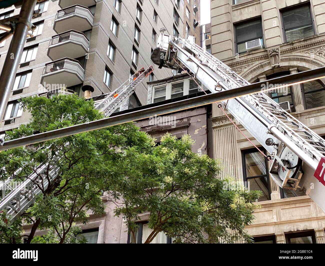 Two telescoping ladders hi-res stock photography and images - Alamy