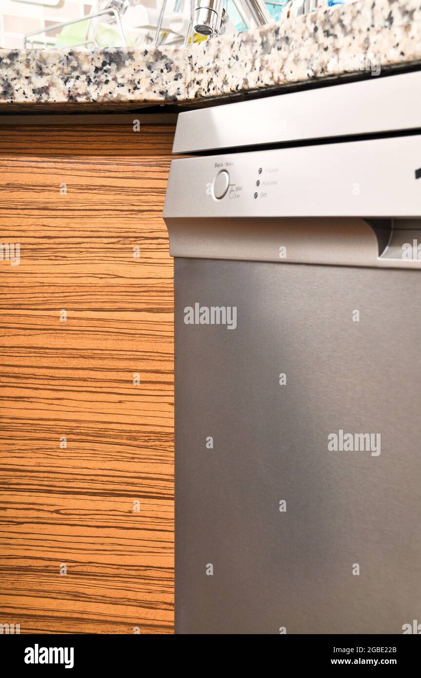 Stainless steel dishwasher in a modern kitchen, dishwasher detail Stock ...