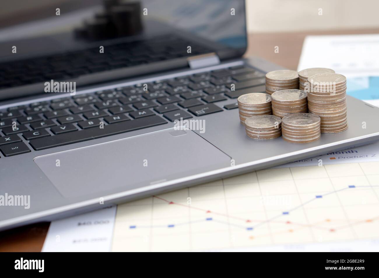 Money and laptop Stock Photo - Alamy