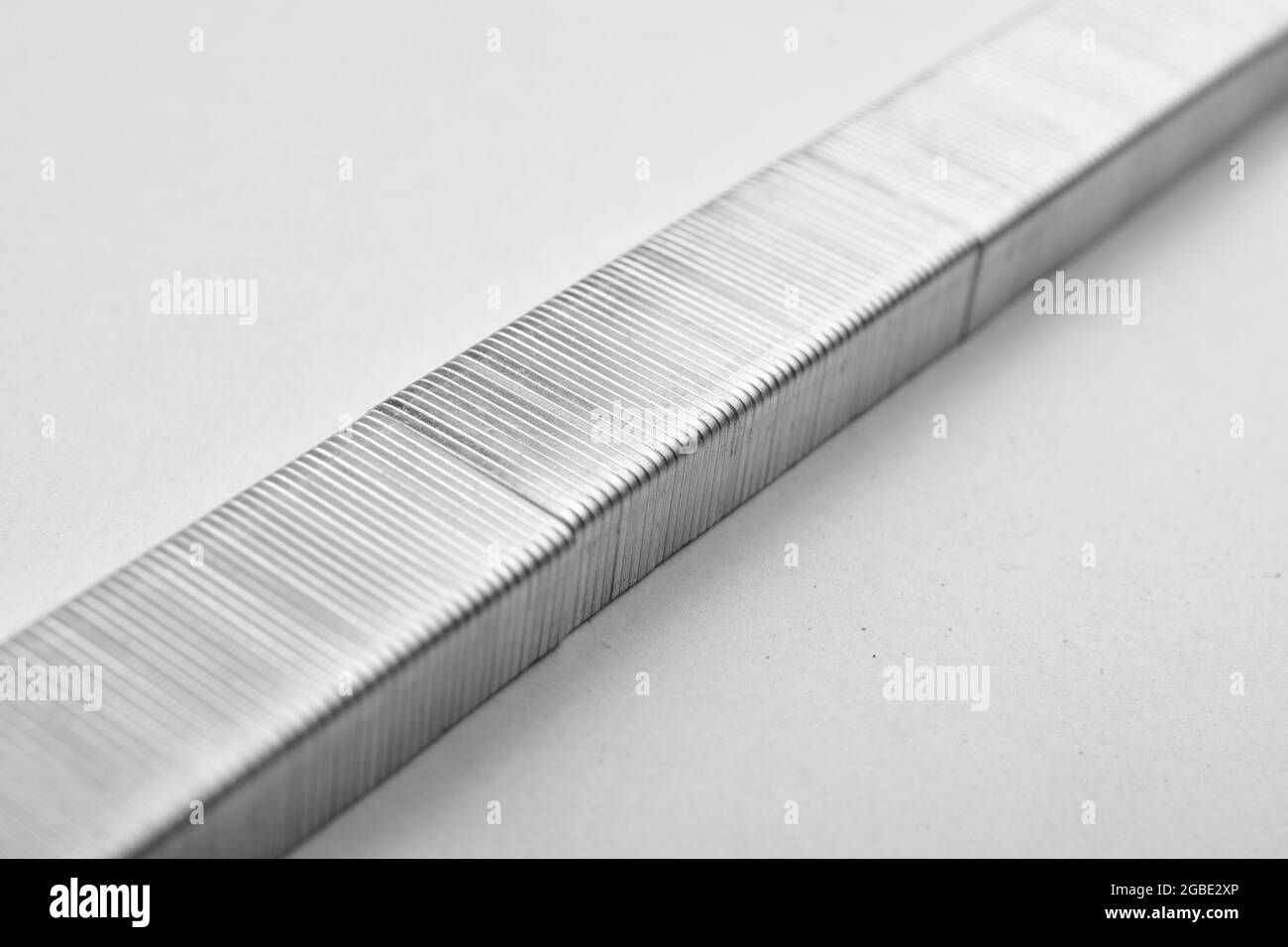 Stapler Pins On White Background Stock Photo - Alamy