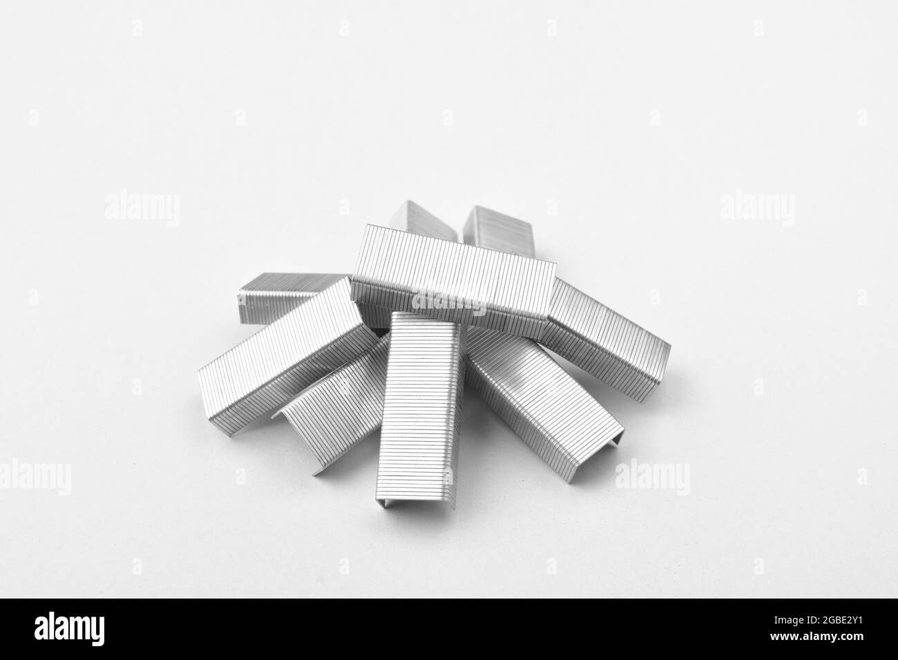 Stack Of Stapler Pins Isolated On White background Stock Photo - Alamy
