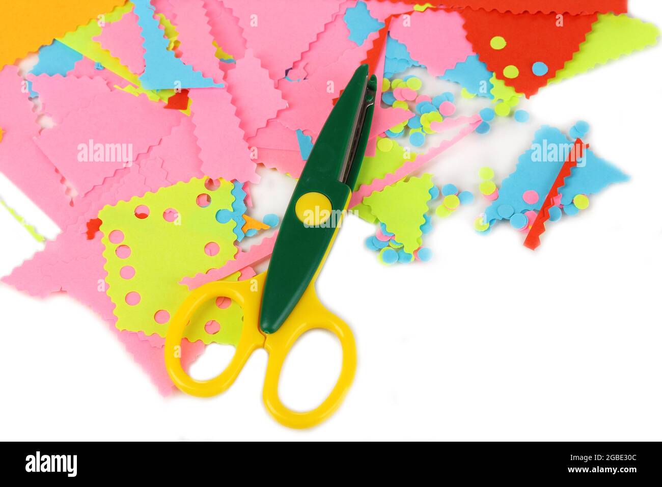 Colorful zigzag scissors with color paper isolated on white Stock Photo ...