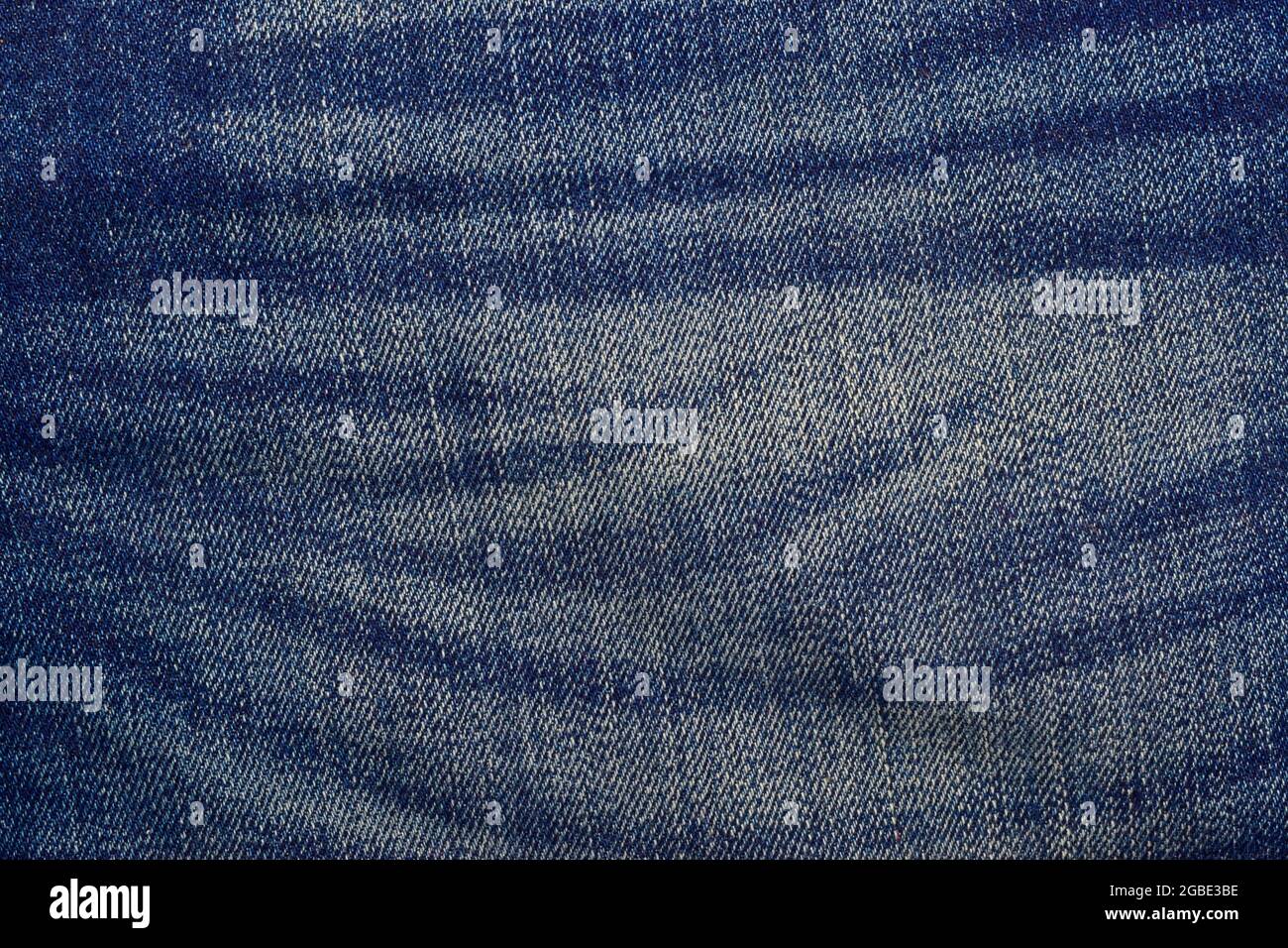 Stone Washed Denim jeans Texture Stock Photo - Alamy