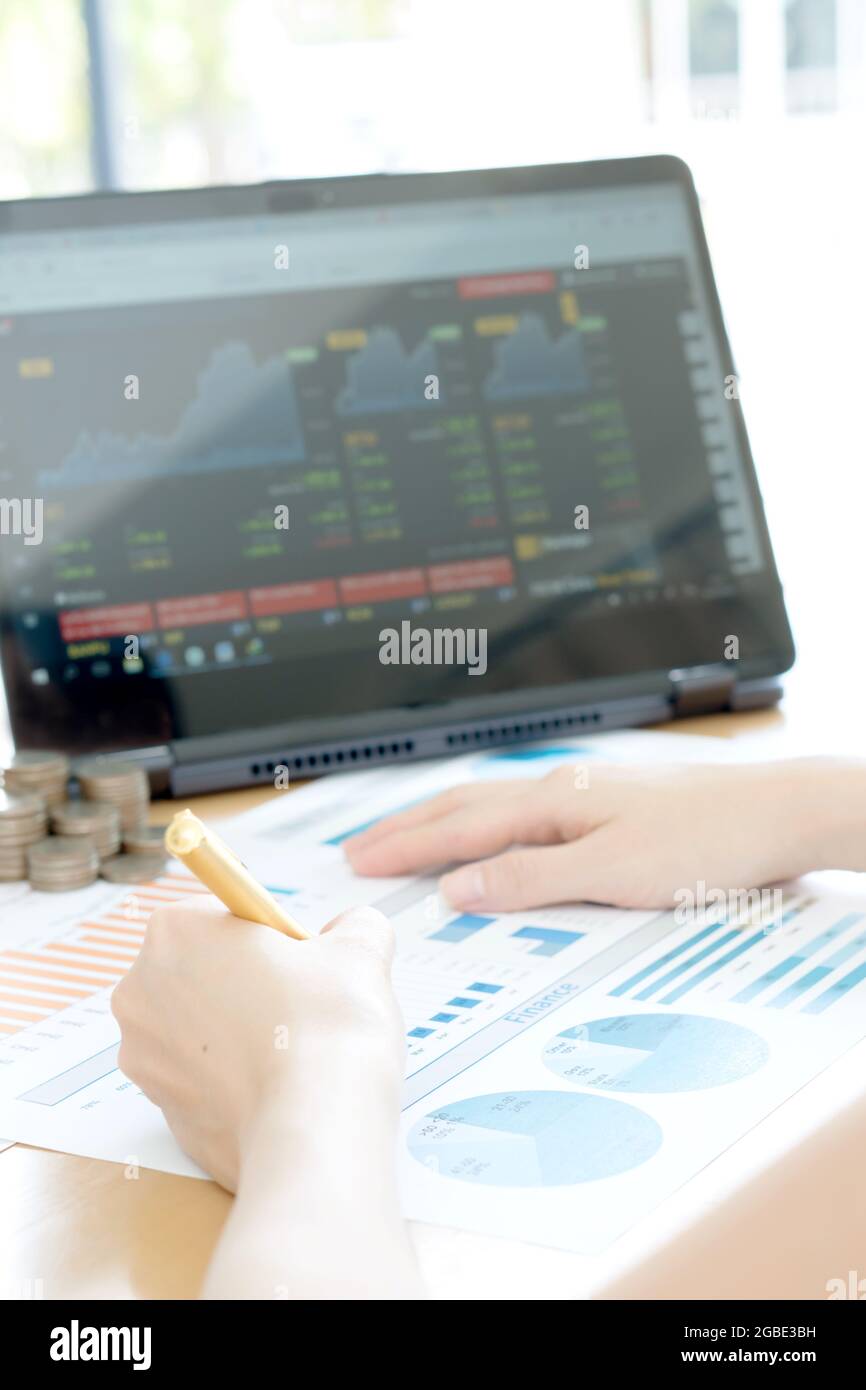 Businesswoman analyzing the latest figures Stock Photo - Alamy