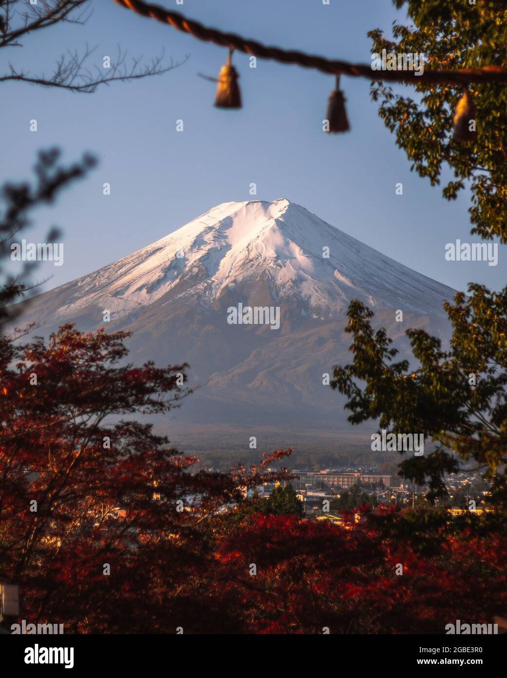 Vertical shot of Mount Fuji under the sunlight and a blue sky in Japan ...