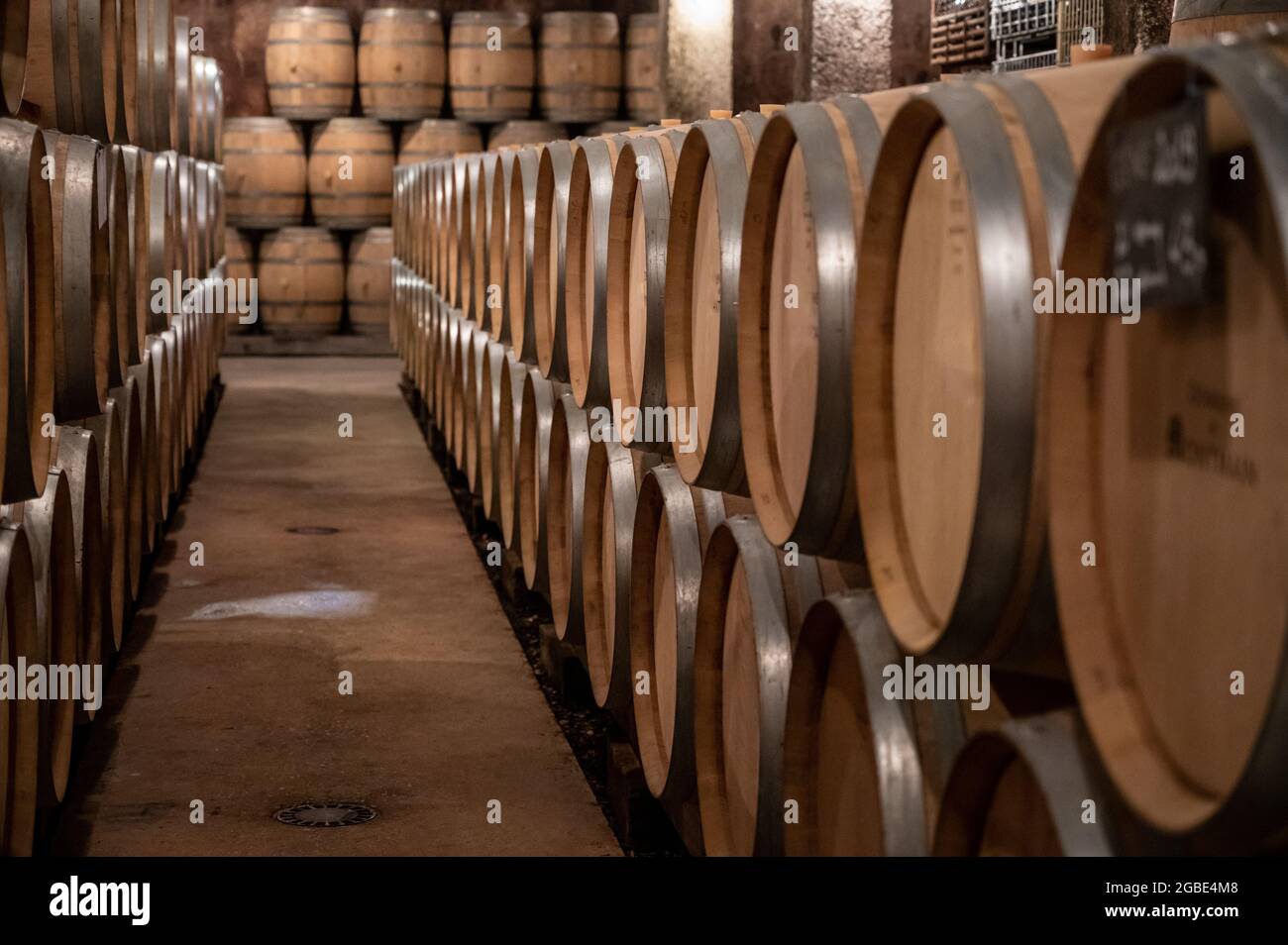 Keeping for years of dry red wine in new oak barrels in caves in ...