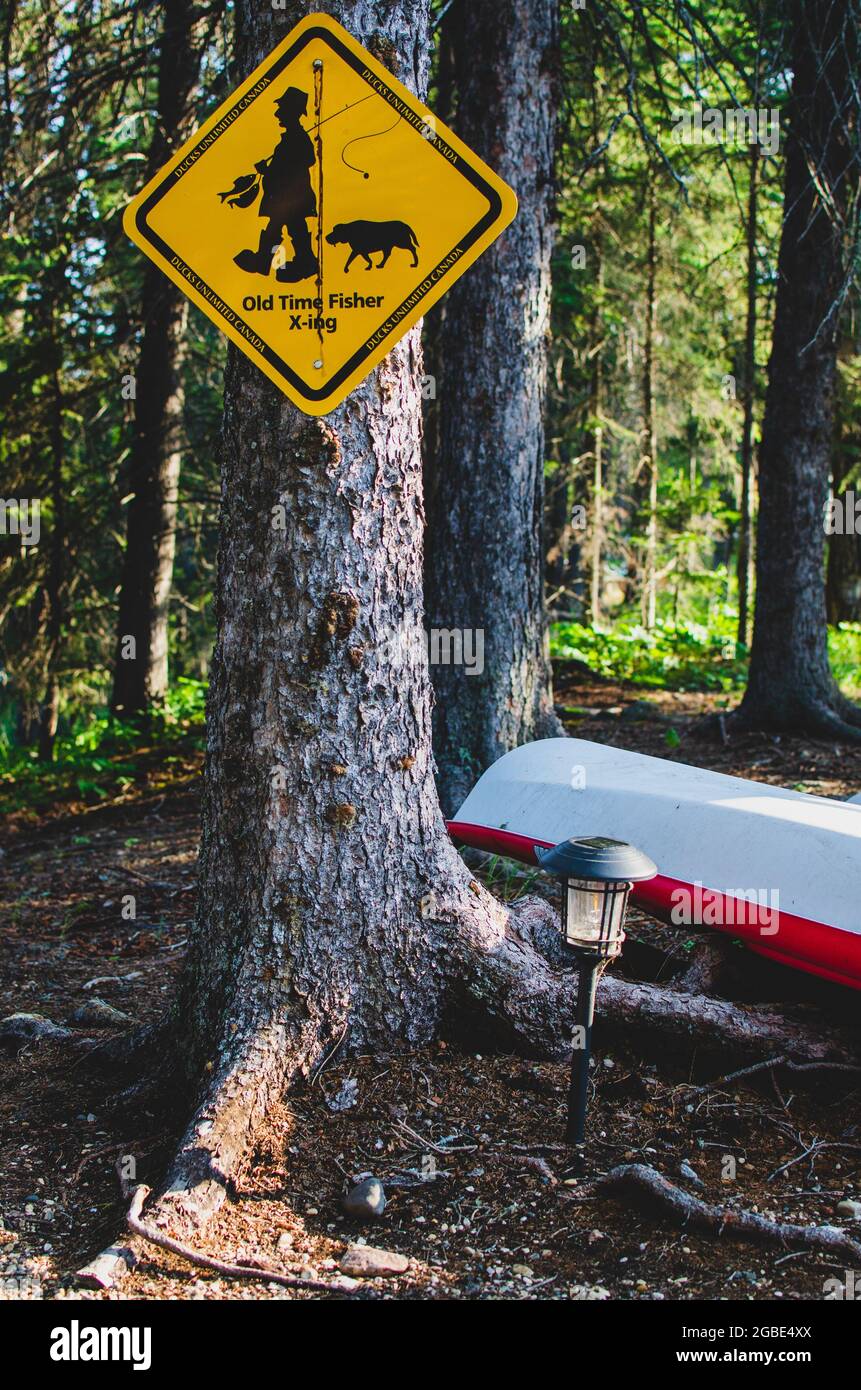 fishing sign and kayak at lake Stock Photo - Alamy