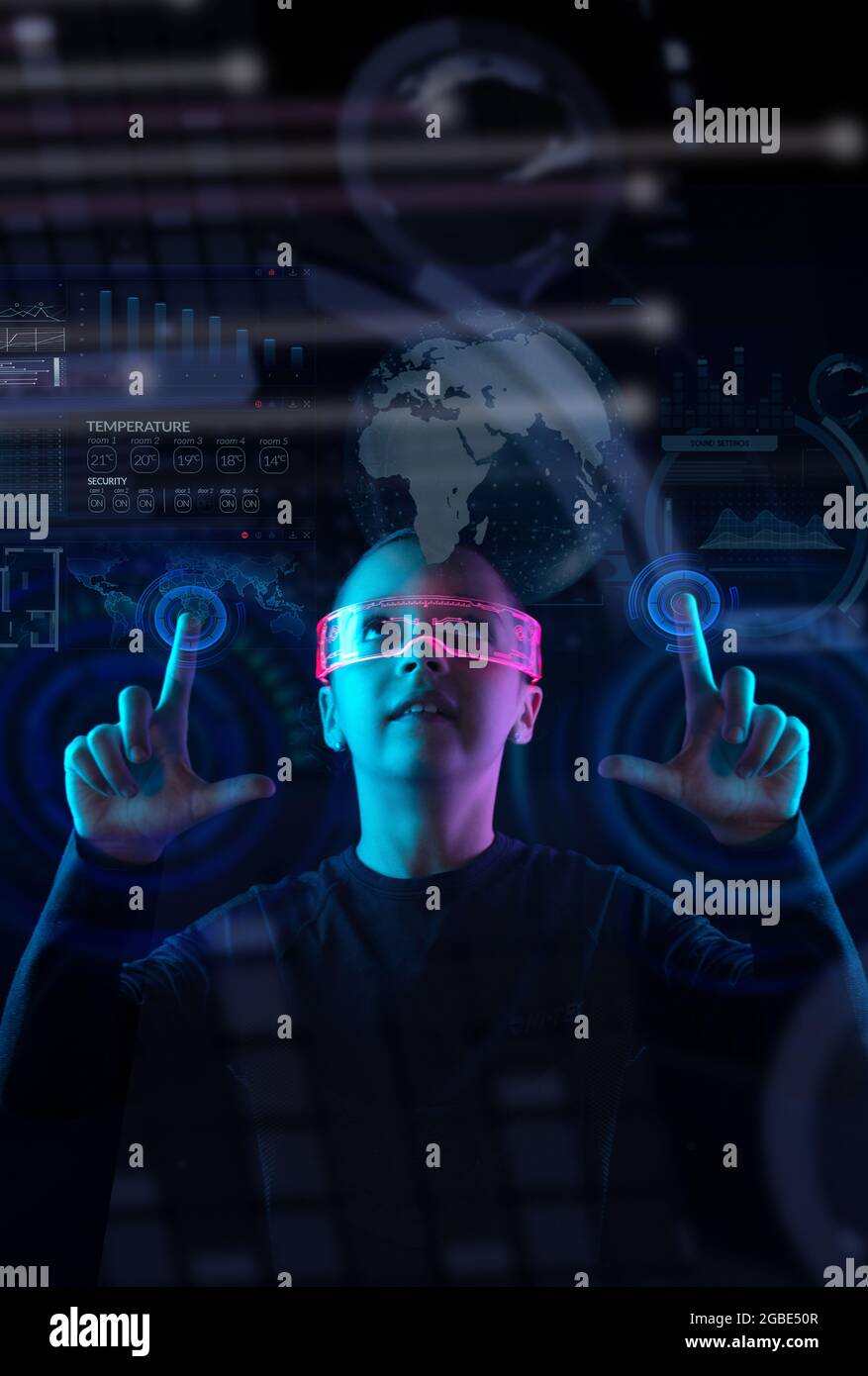 Smart, cute girl using a futuristic digital devices Stock Photo - Alamy